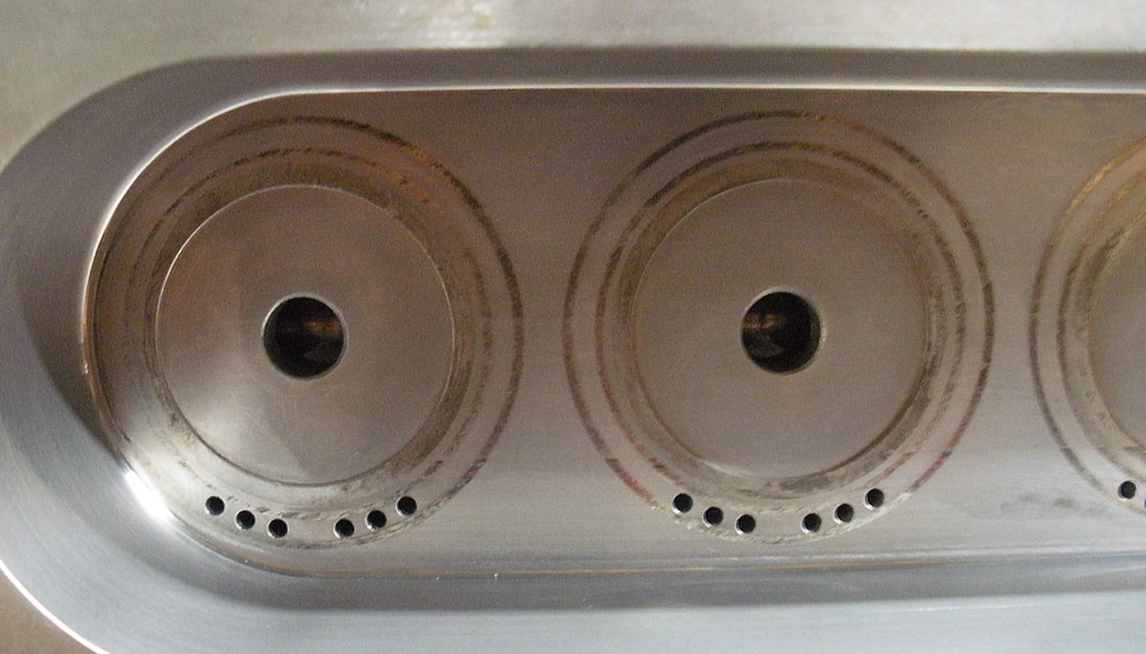 Preform injection molder increases production cycles with dry ice